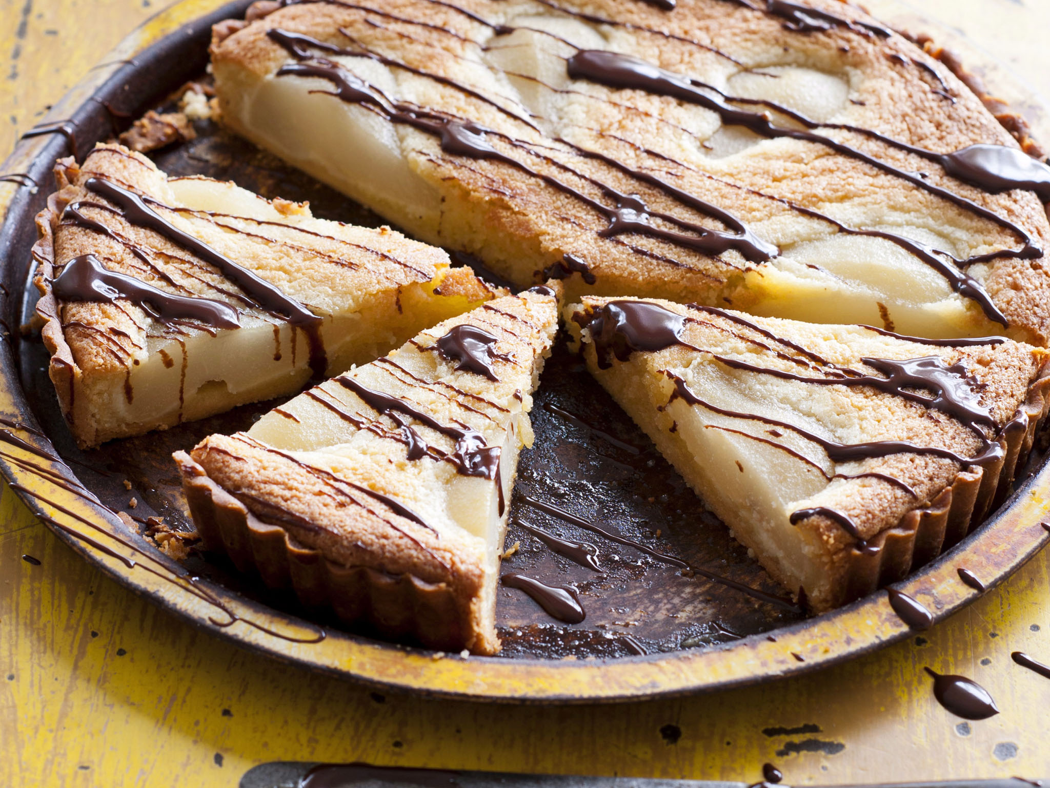 Poached pear tart with warm chocolate sauce | Women's Weekly Food