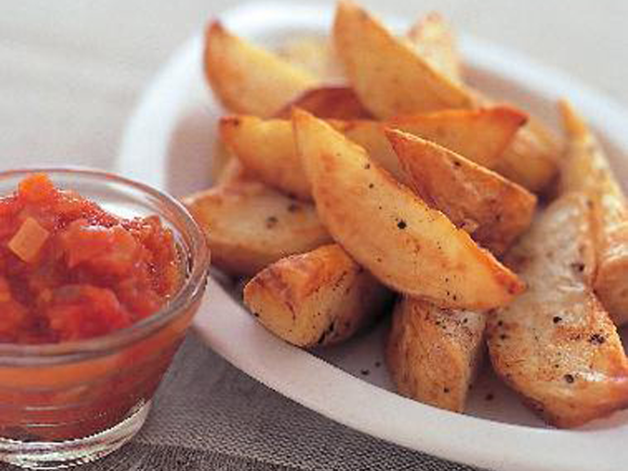 Oven-roasted potato wedges with tomato relish | Women's Weekly Food